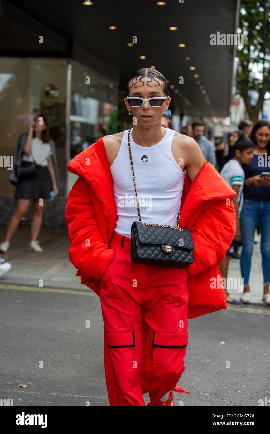 London, UK. 18th Sep, 2021. Fashionista in a red outfit is seen during ...