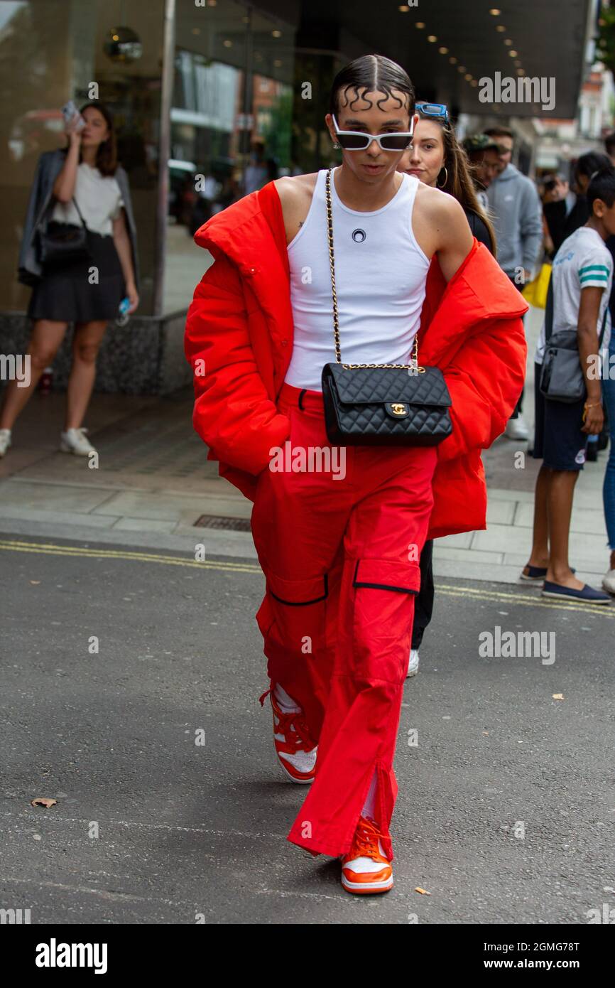 London, UK. 18th Sep, 2021. Fashionista in a red outfit is seen during ...