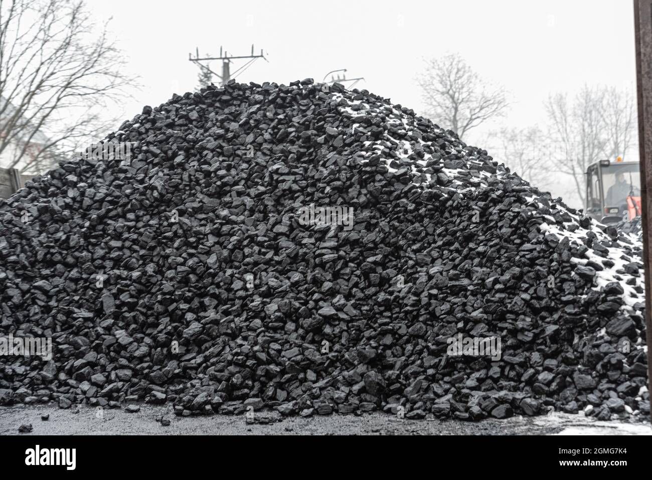 Coal and snow. Fuel composition in winter. Hard coal for sale. Fuel for ...