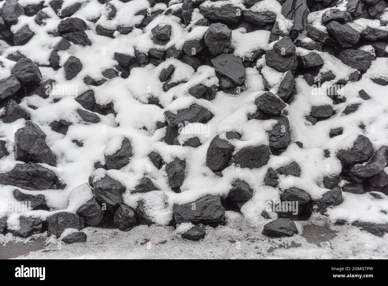 Coal and snow. Fuel composition in winter. Hard coal for sale. Fuel for ...