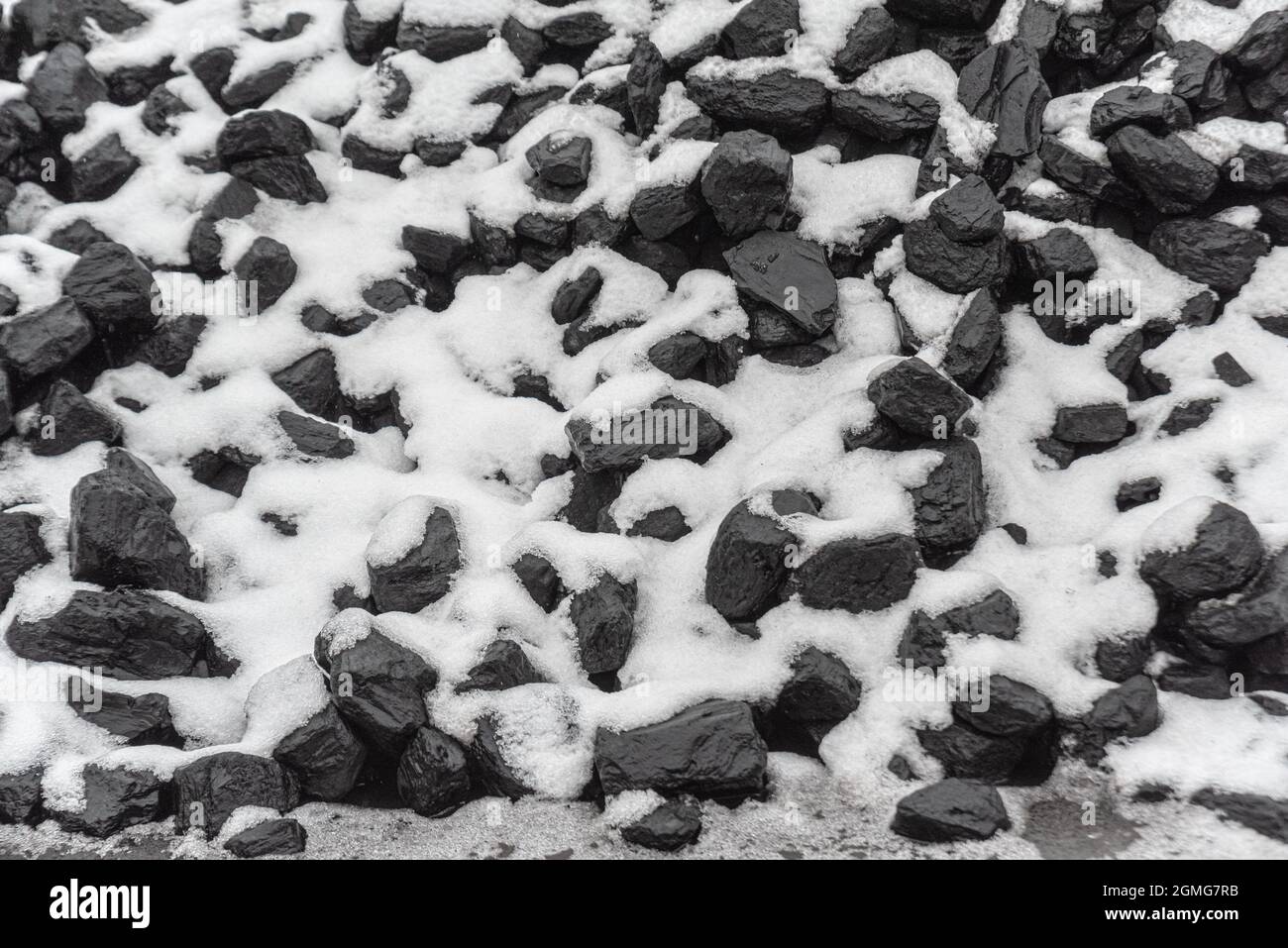 Coal and snow. Fuel composition in winter. Hard coal for sale. Fuel for ...