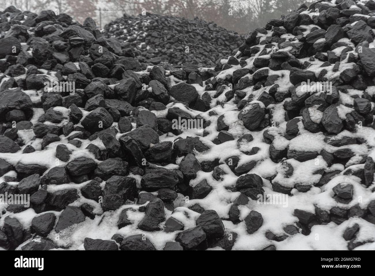 Coal and snow. Fuel composition in winter. Hard coal for sale. Fuel for ...