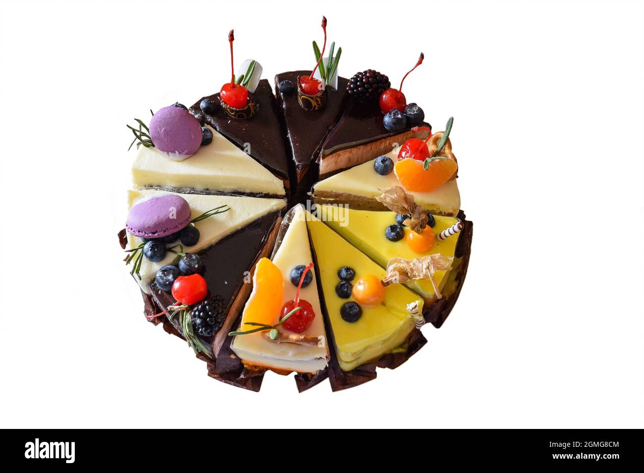 Sliced cake made from different types of separate pieces on a clean ...