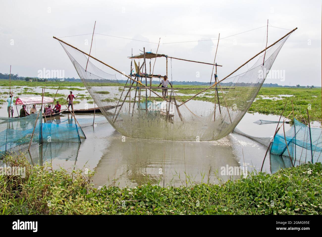 Unique style fishing net. There are bamboo structures with nets and ...