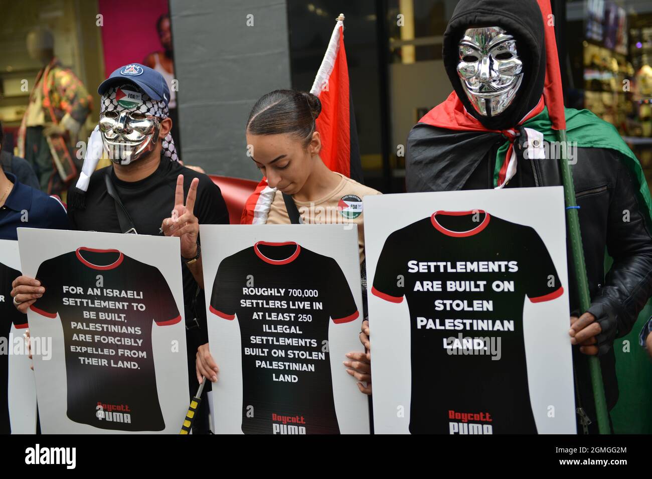 Protesters with banners are taking part in Boycott Puma protest at ...