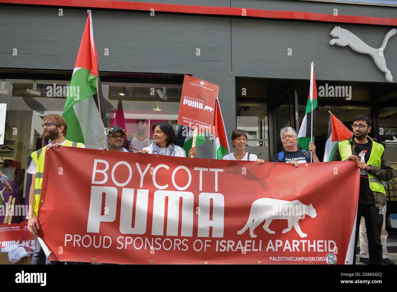 Protesters holding placards and flags, during the demonstration.Boycott ...