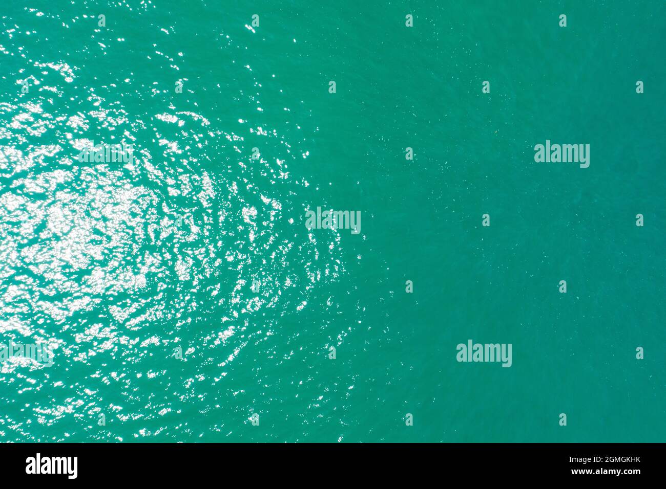 Top down aerial view of turquoise ocean Sea surface and wave texture ...