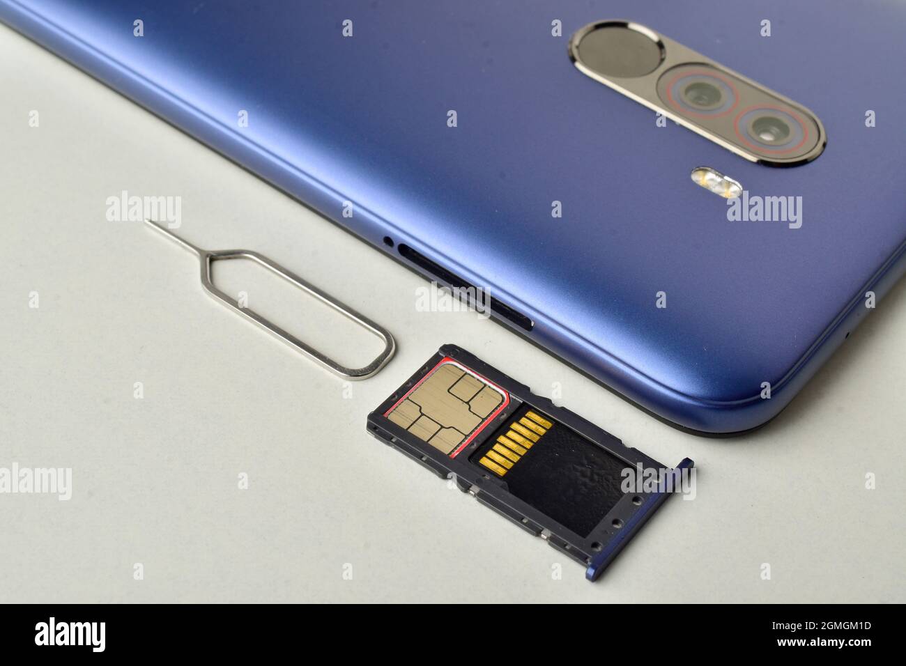 phone with sim ejector and and sim tray on white background Stock Photo ...
