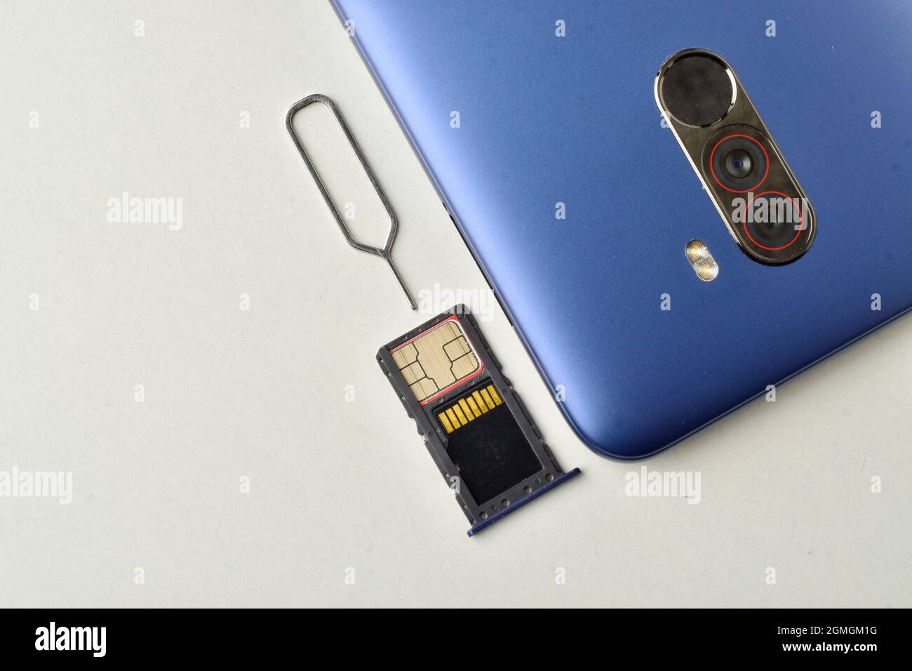 Smartphone with sim and memory card isolated on white background Stock ...