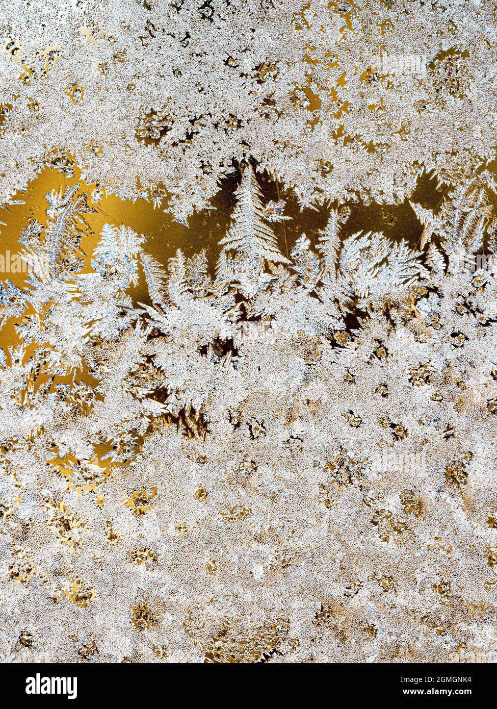 Window frost pattern with sunrise light Stock Photo - Alamy