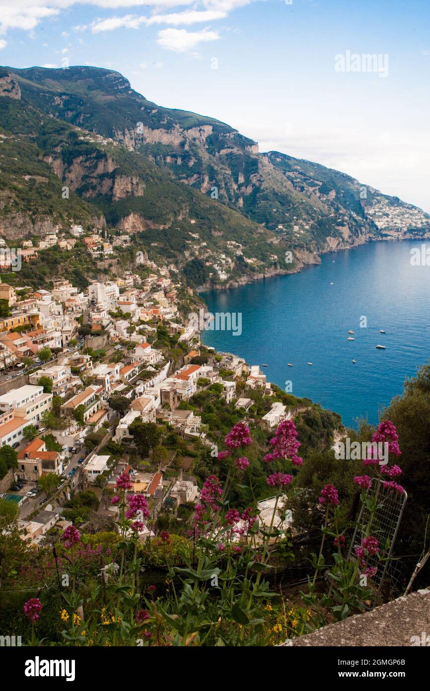 Houses of a scenic seaside village dot the hillside overlooking the ...