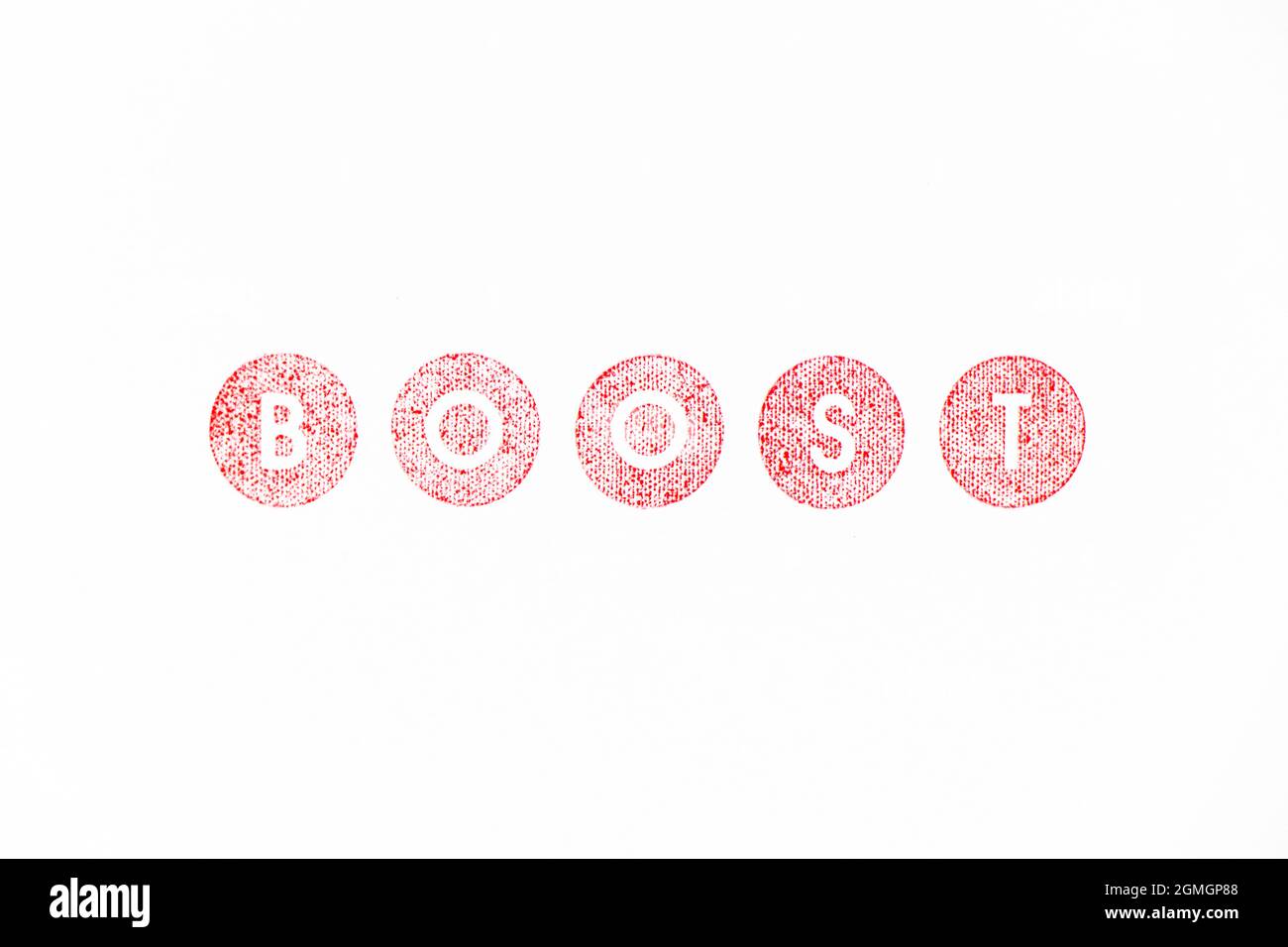 Red color rubber stamp in word boost on white paper background Stock ...