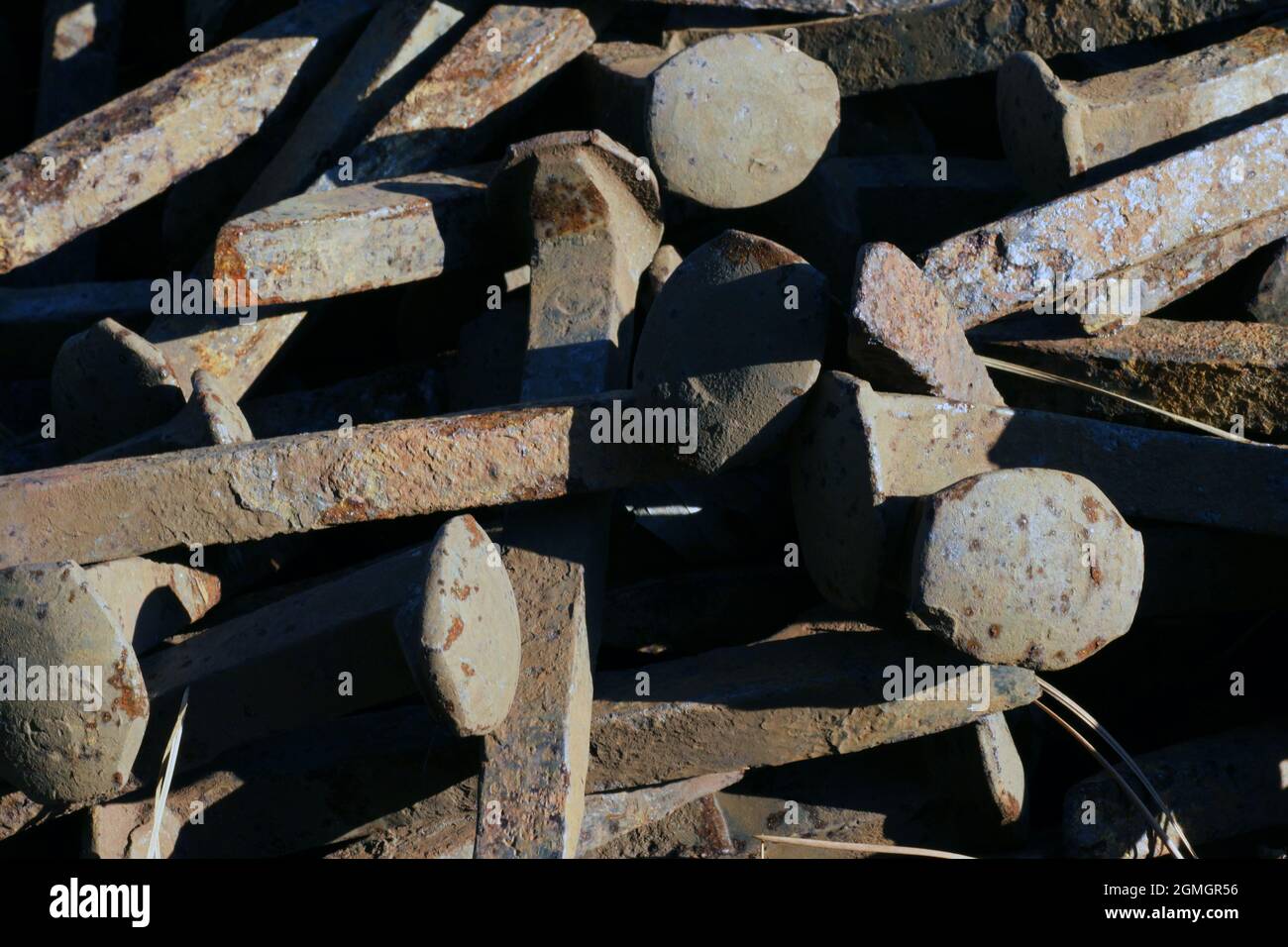 Stack of rusty railroad spikes Stock Photo - Alamy