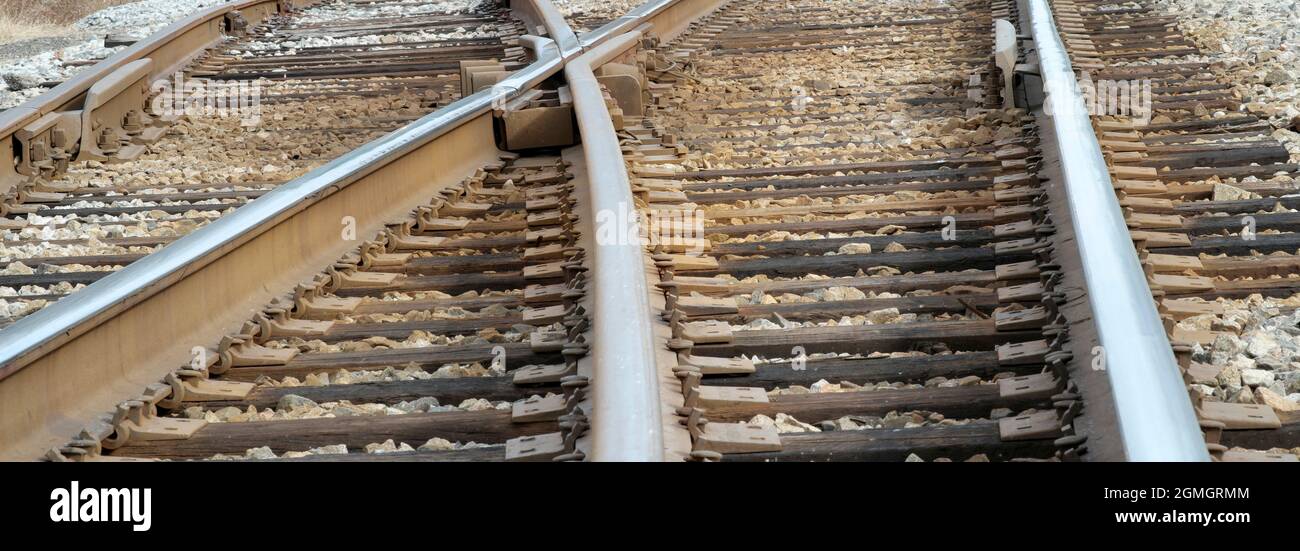 Train rail intersection on sunny day Stock Photo - Alamy