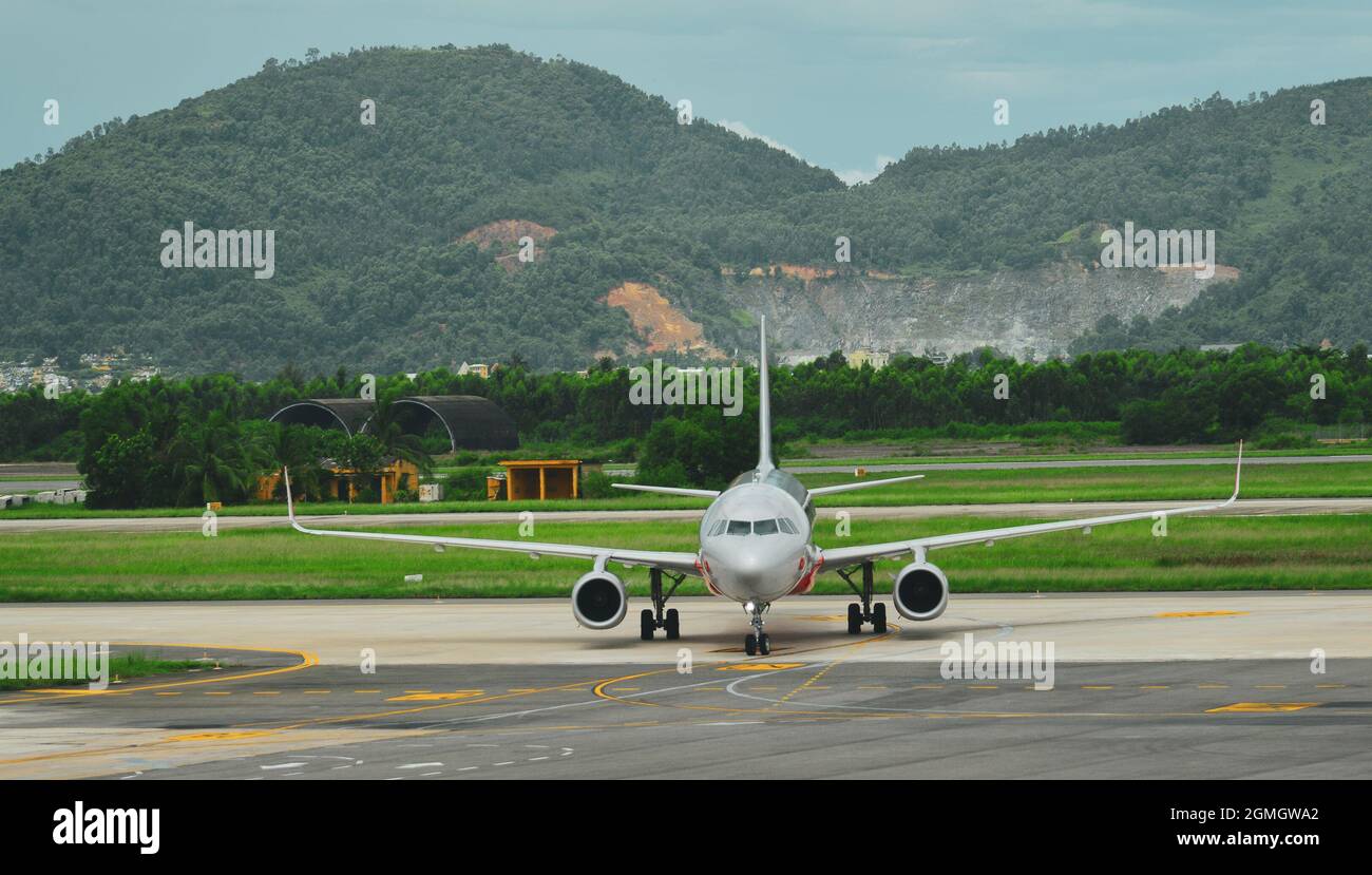 Passenger airplane on runway of Da Nang Airport (DAD), Vietnam Stock ...