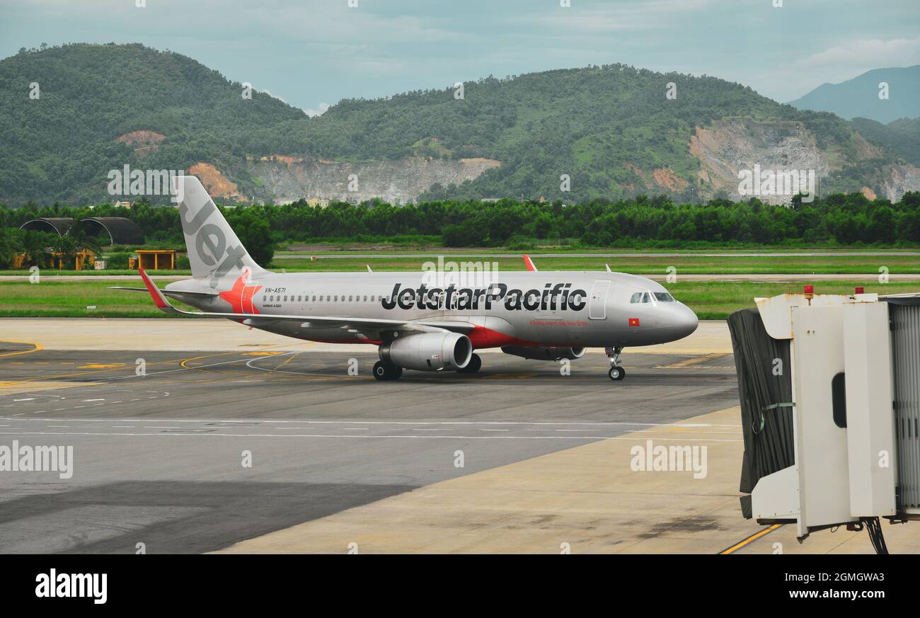 Da Nang, Vietnam - Jul 23, 2018. Jetstar Pacific airplane landing at Da ...