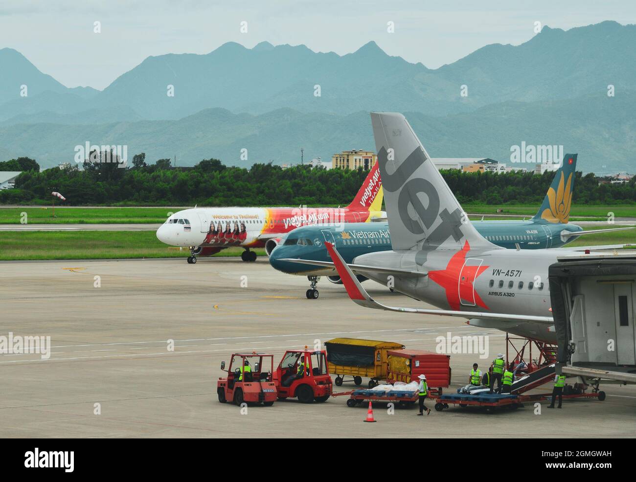 Da Nang, Vietnam - Jul 23, 2018. Passenger airplanes docking at Da Nang ...