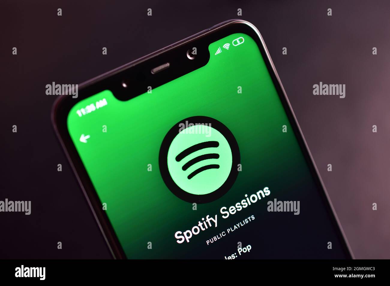 Spotify on phone hi-res stock photography and images - Alamy