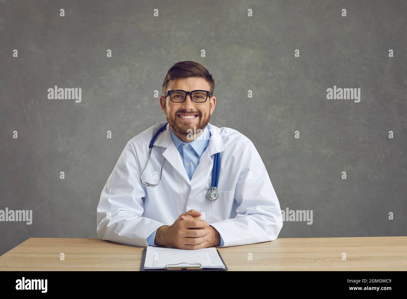 Happy smiling caucasian male doctor hi-res stock photography and images ...