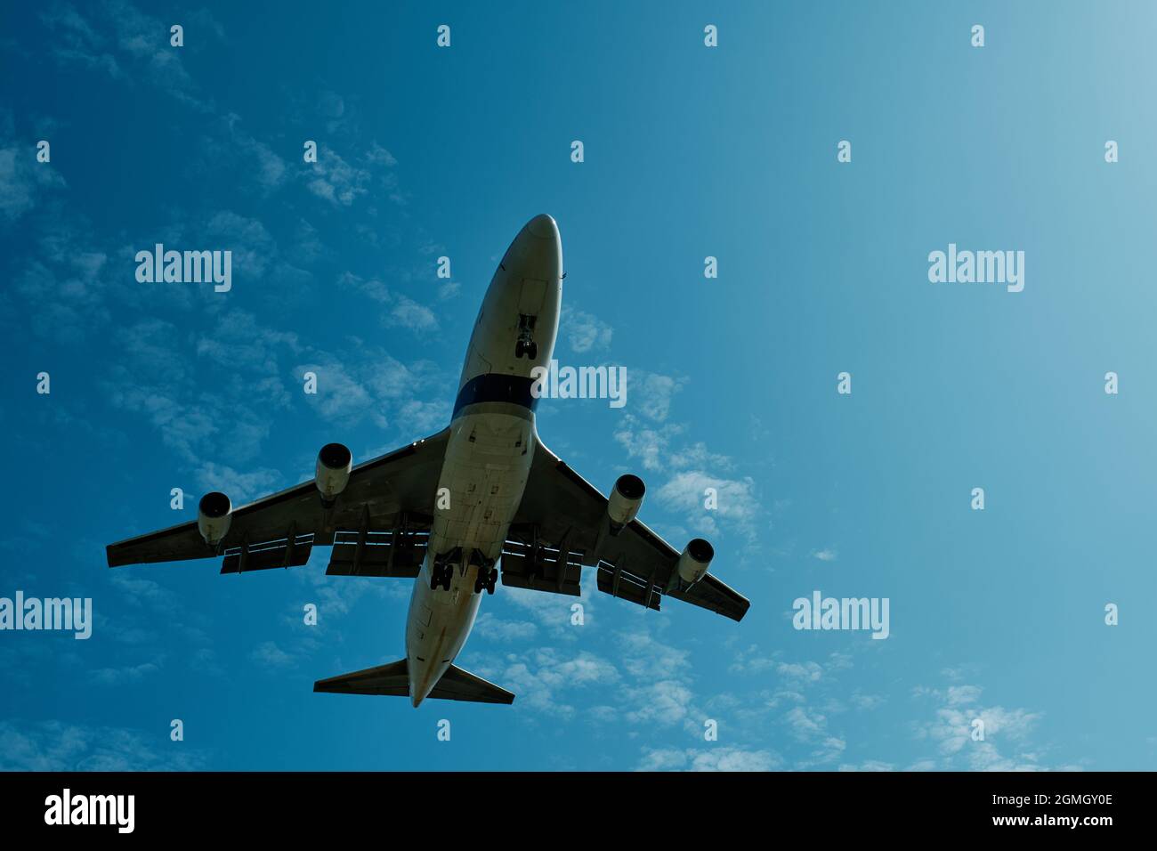 an airplane in flight taking off Stock Photo - Alamy