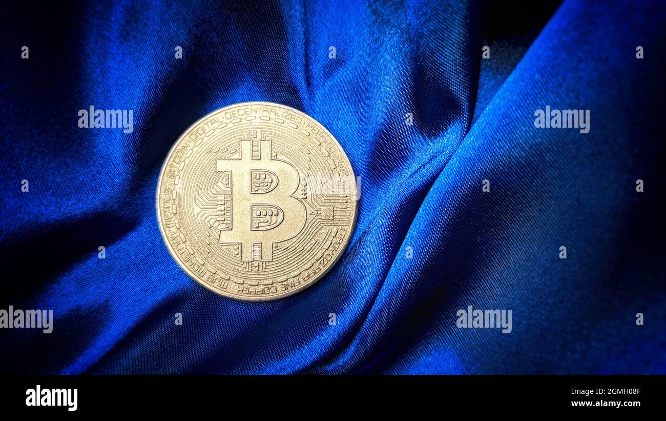Gold bitcoins with Candle stick graph chart and digital background ...