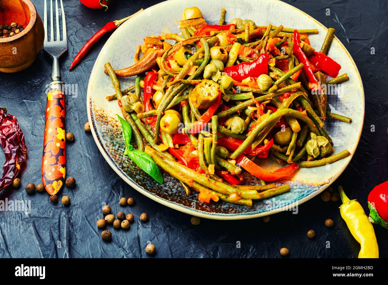 Spicy vegetable appetizer made from pepper, asparagus beans, tomato and ...