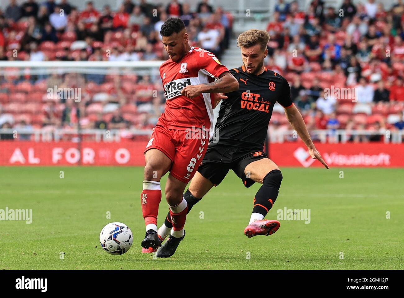 Luke Garbutt #29 of Blackpool and Onel Hernandez #8 of Middlesbrough ...