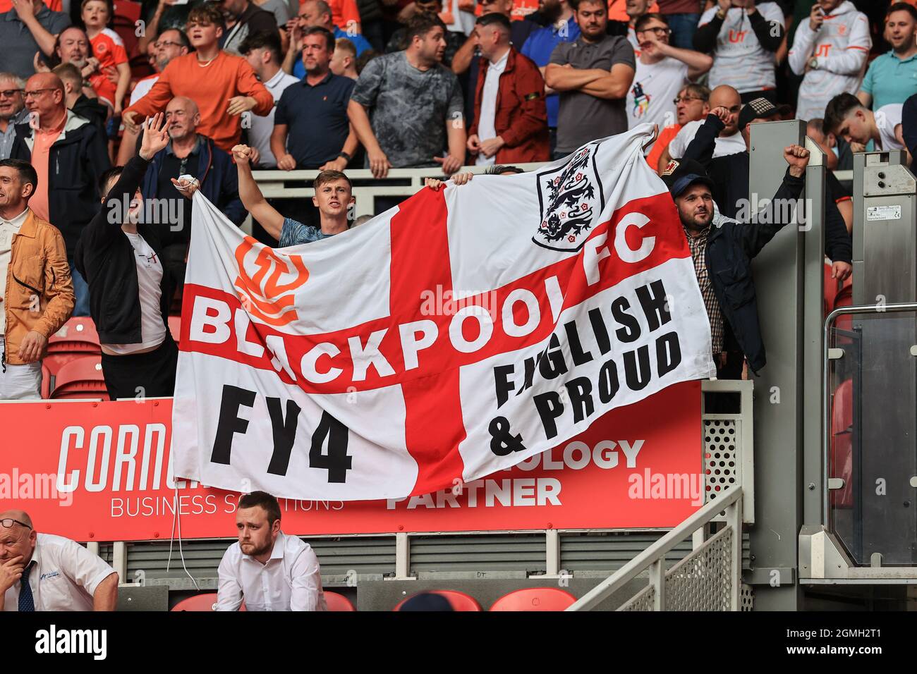 Blackpool fans hold up a huge flag as Blackpool head out to win 1-2 ...