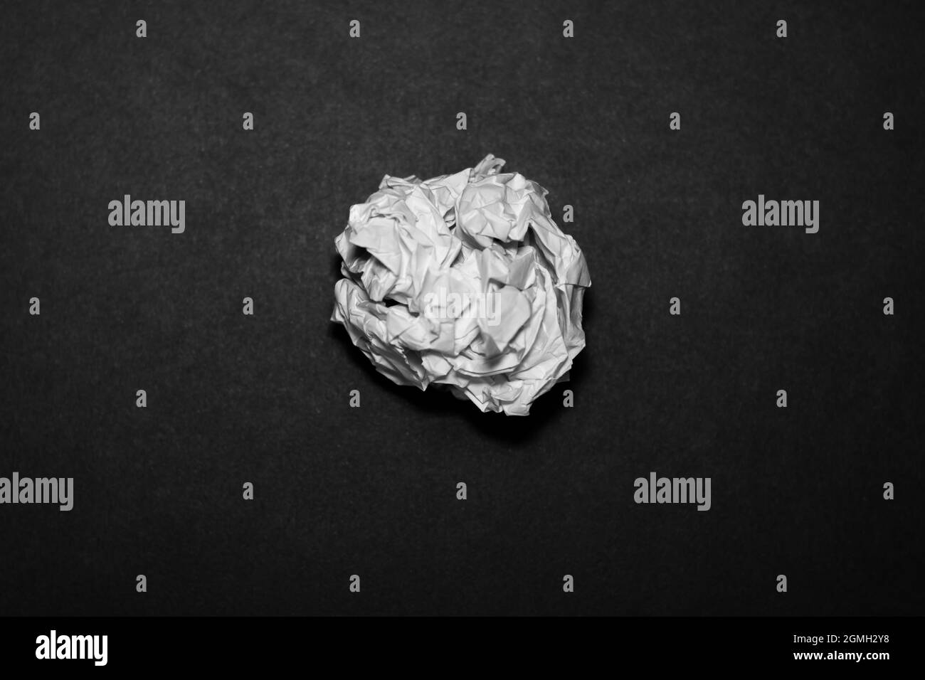 Close up of wadded up paper ball, crumpled ball of white paper isolated ...