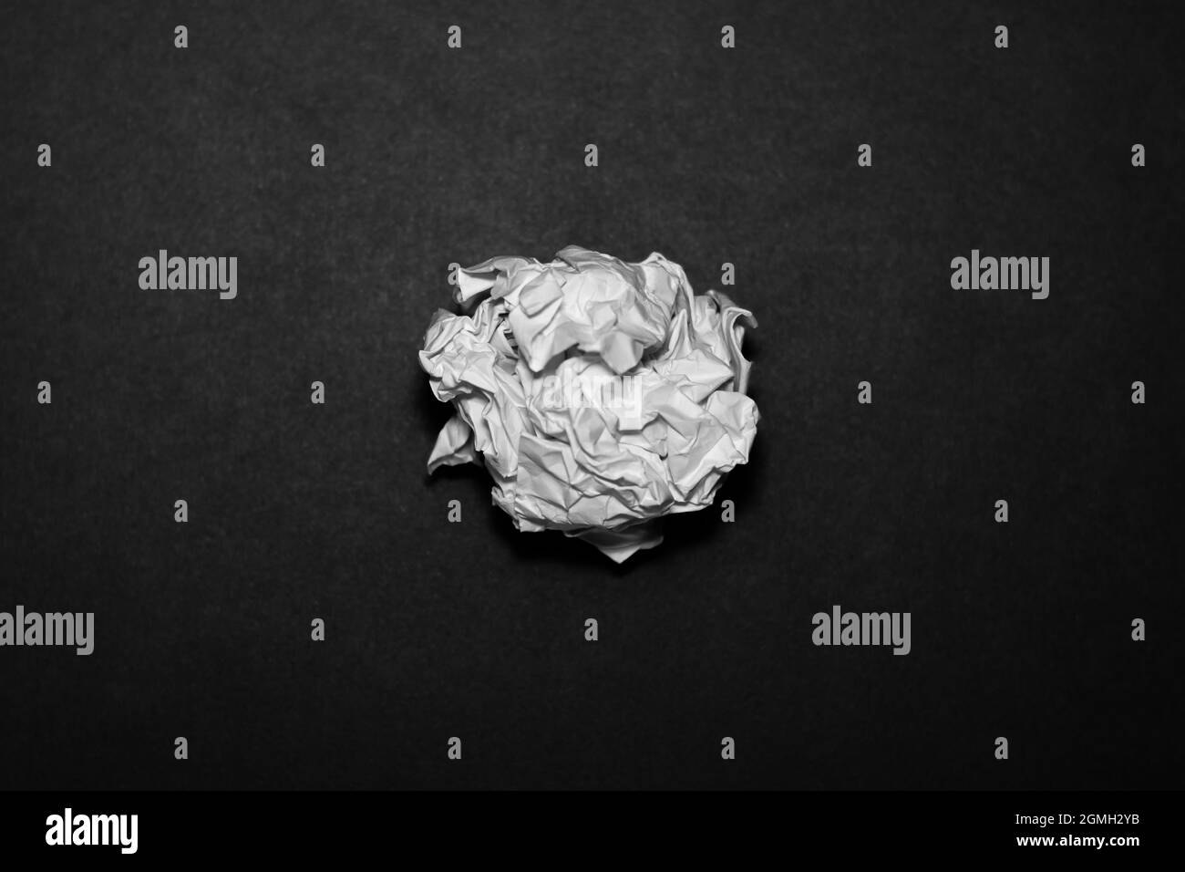 Close up of wadded up paper ball, crumpled ball of white paper isolated ...