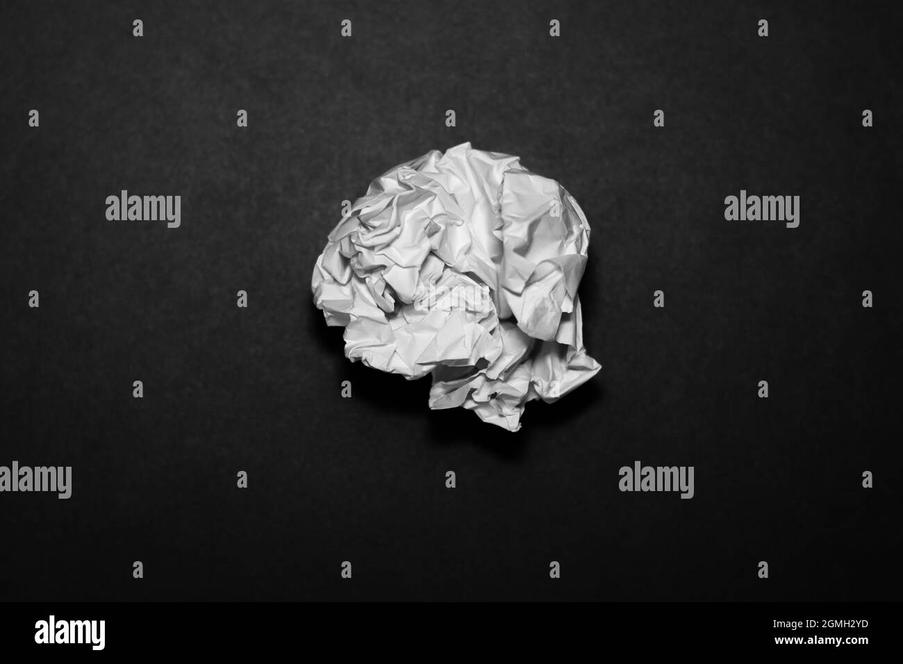 Close up of wadded up paper ball, crumpled ball of white paper isolated ...