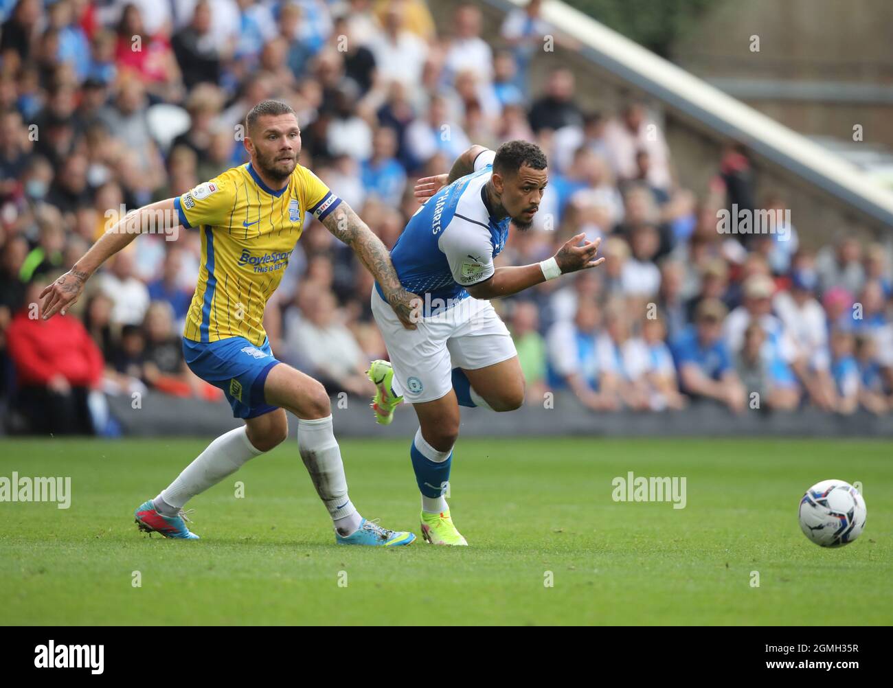 Peterborough, UK. 18th Sep, 2021. Harlee Dean (BC) Jonson Clarke-Harris ...