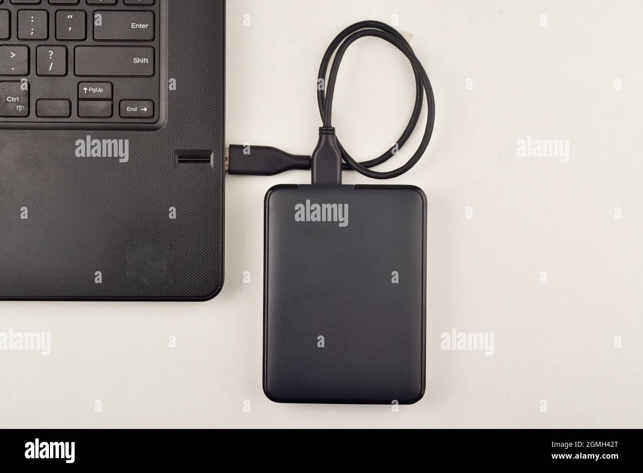 Top View of External Hard Drive Connected to Laptop Stock Photo - Alamy