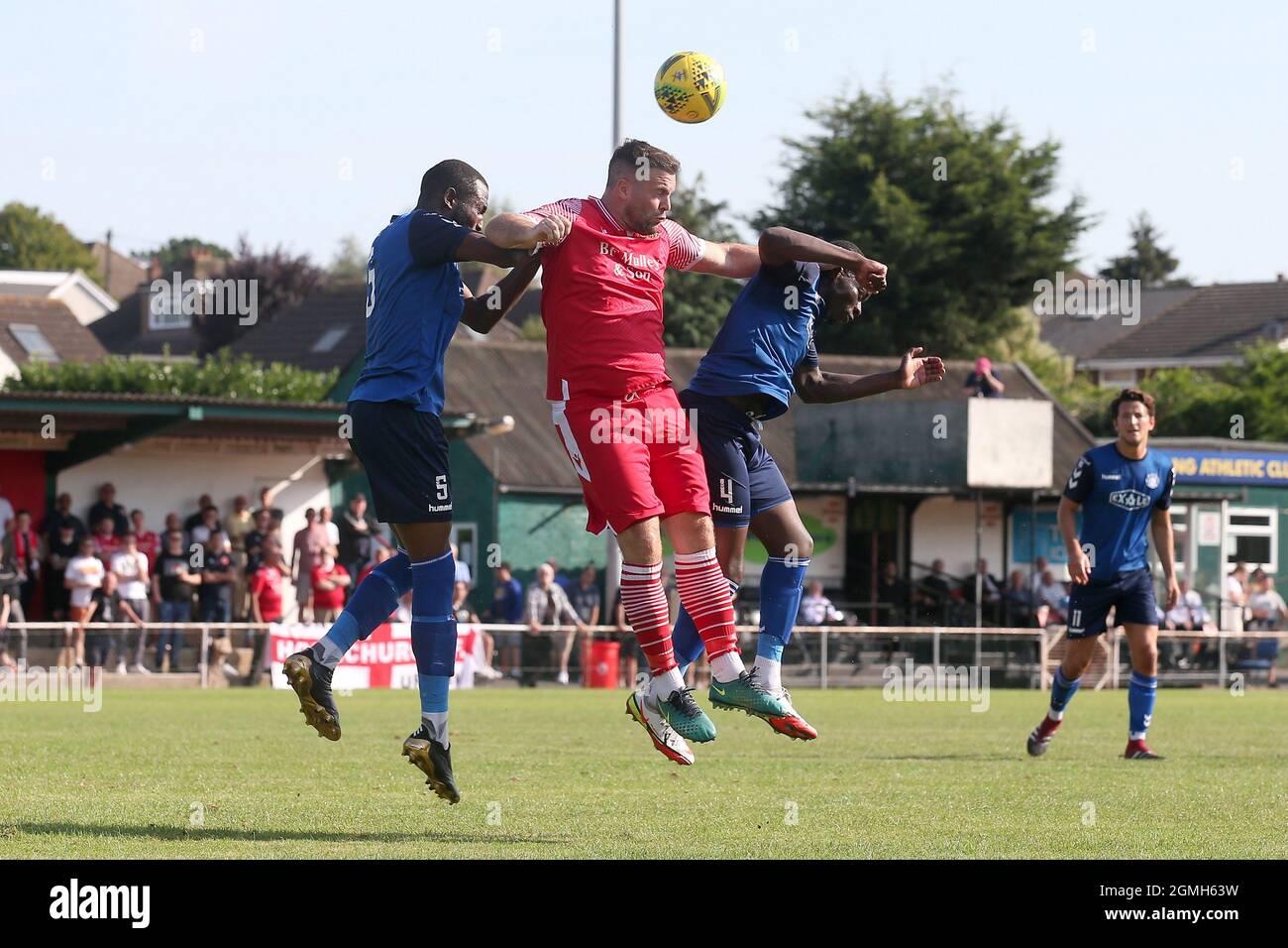 Sam Higgins of Hornchurch rises with Moses Carvalho of Walthamstow ...