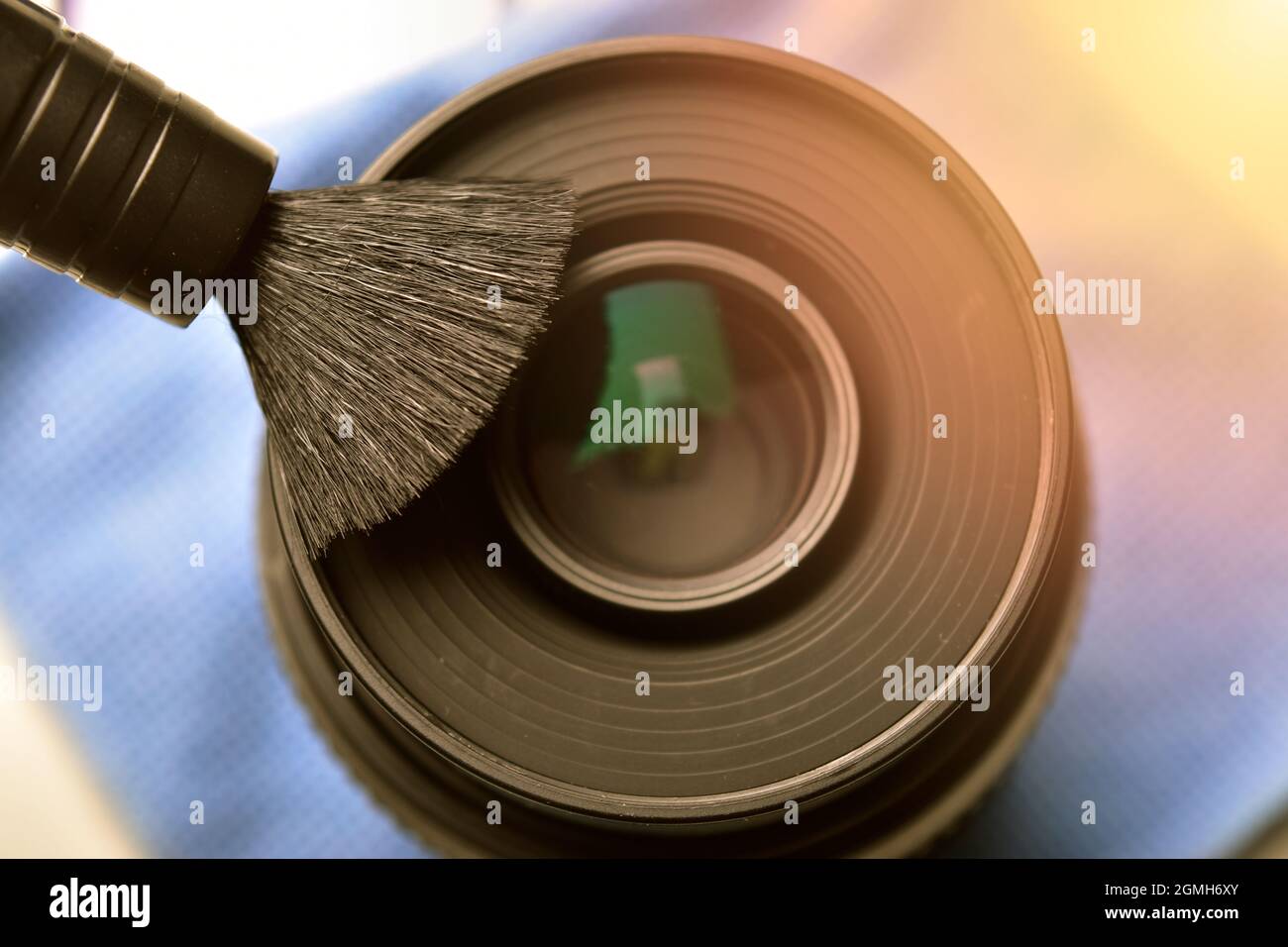 cleaning camera lens from brush and removing dust Stock Photo - Alamy
