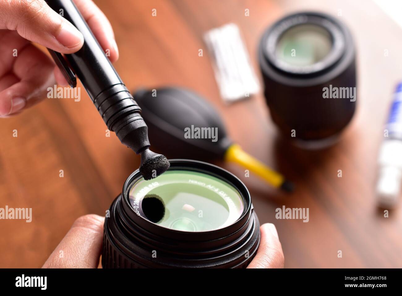 Cleaning Camera Lens with Penbrush Stock Photo - Alamy
