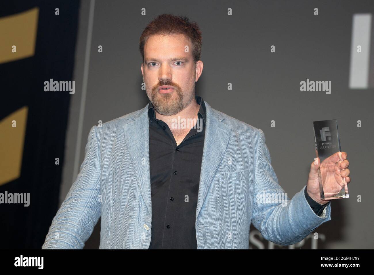 Vincent Deniard receives best actor award during the closing ceremony ...