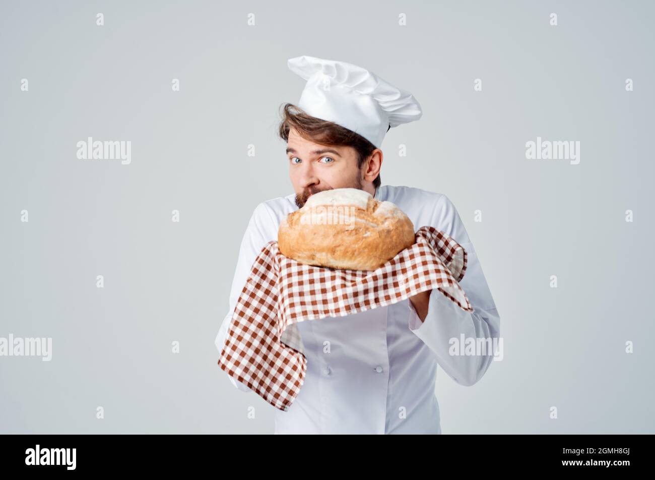Chef with bread in hand Professional emotions Stock Photo - Alamy