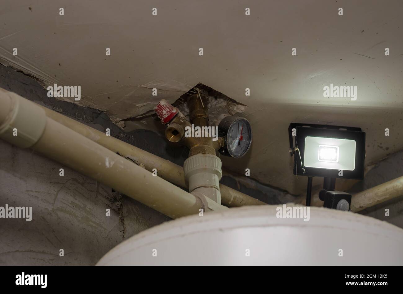 Piping under the ceiling in the boiler room. Spotlight, motion s Stock ...