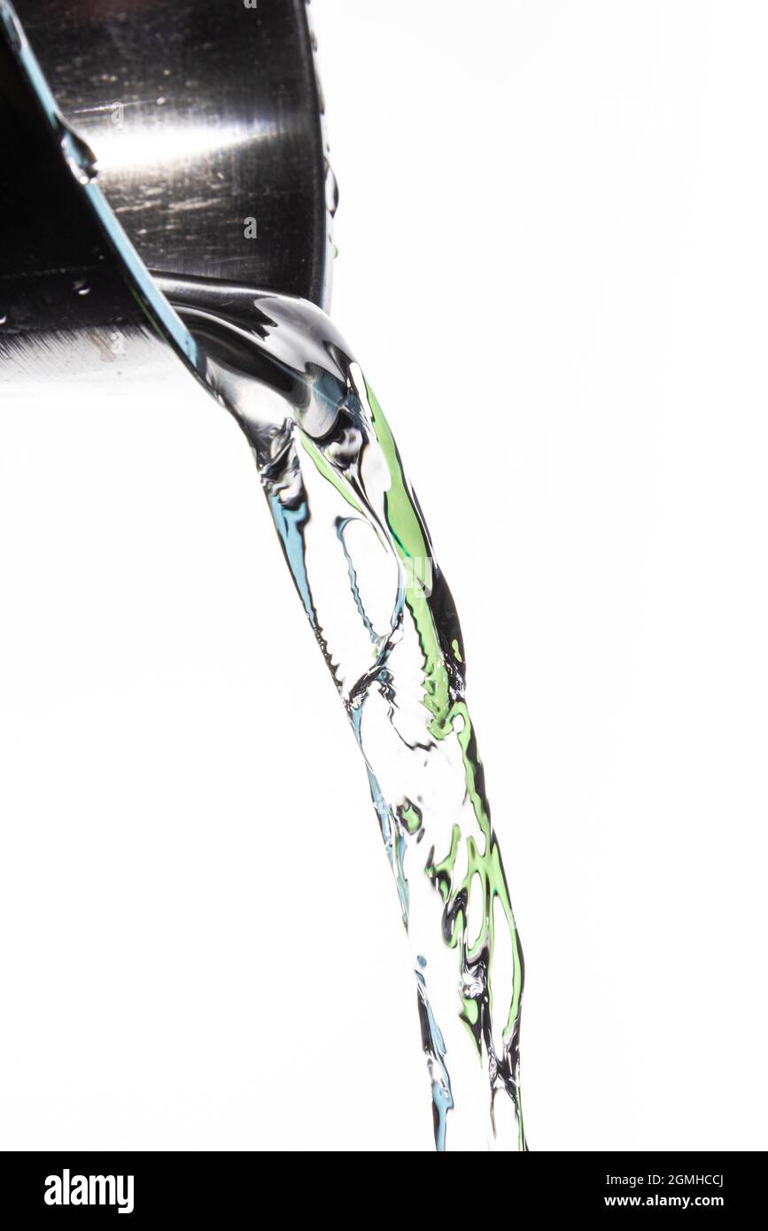 Pouring Water from a jug: Please credit Phillip Roberts Stock Photo - Alamy