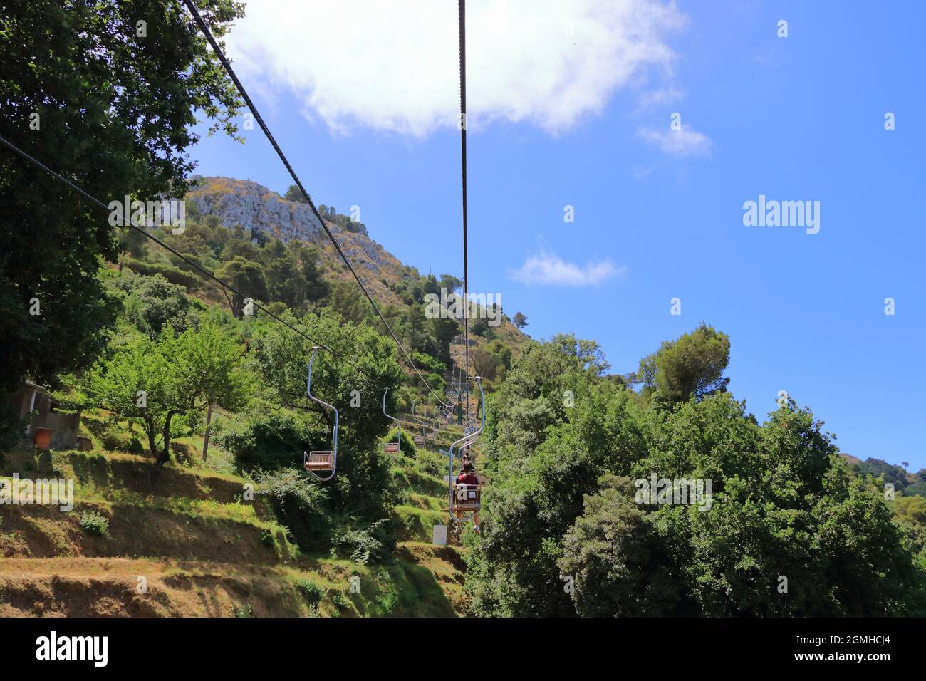 Funicular cable chair above Capri Island in Italy Stock Photo - Alamy