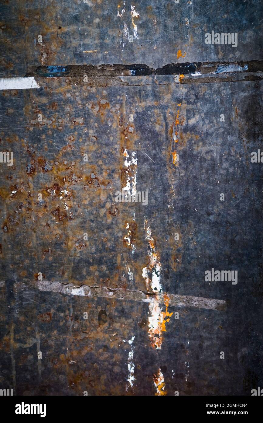 Textural close-up of tape residue on rusty iron, Shek O, Hong Kong ...