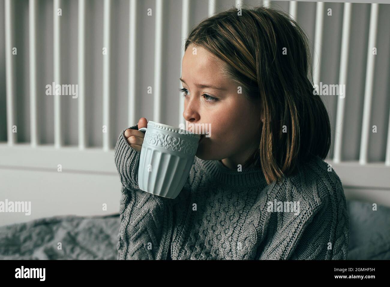 Girl drinking hot chocolate hi-res stock photography and images - Alamy