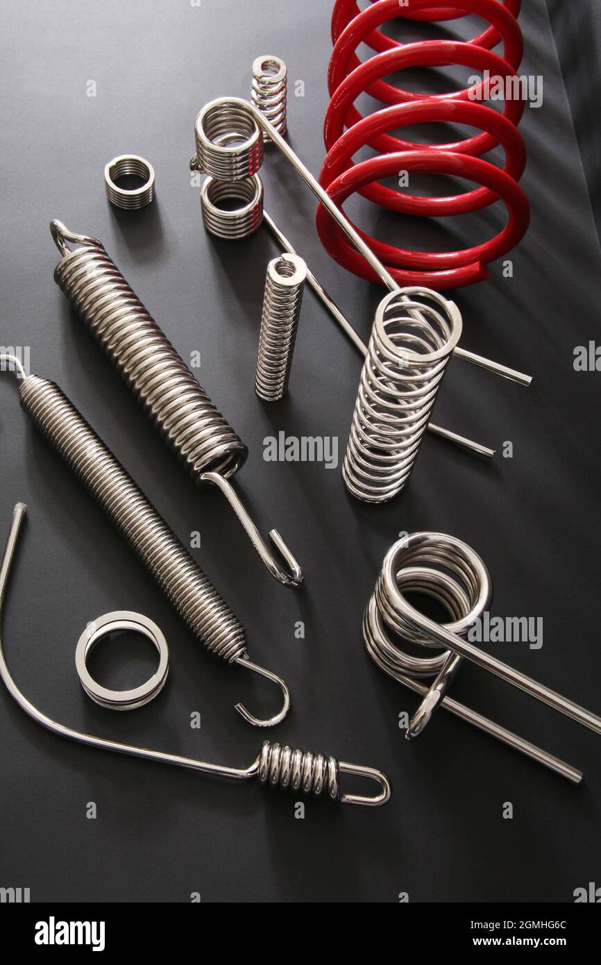 Metal springs in different sizes Stock Photo - Alamy