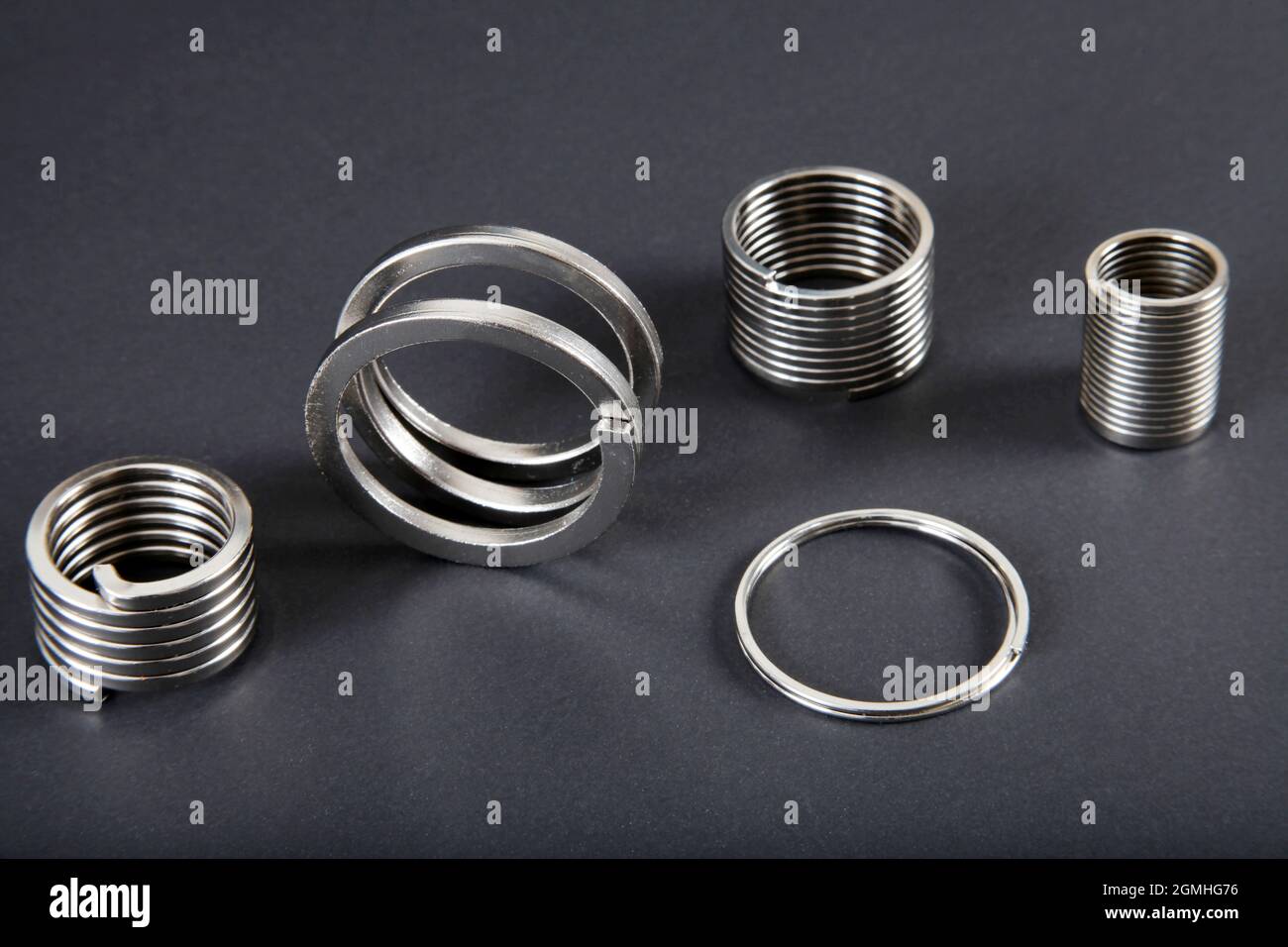 Metal springs in different sizes Stock Photo - Alamy