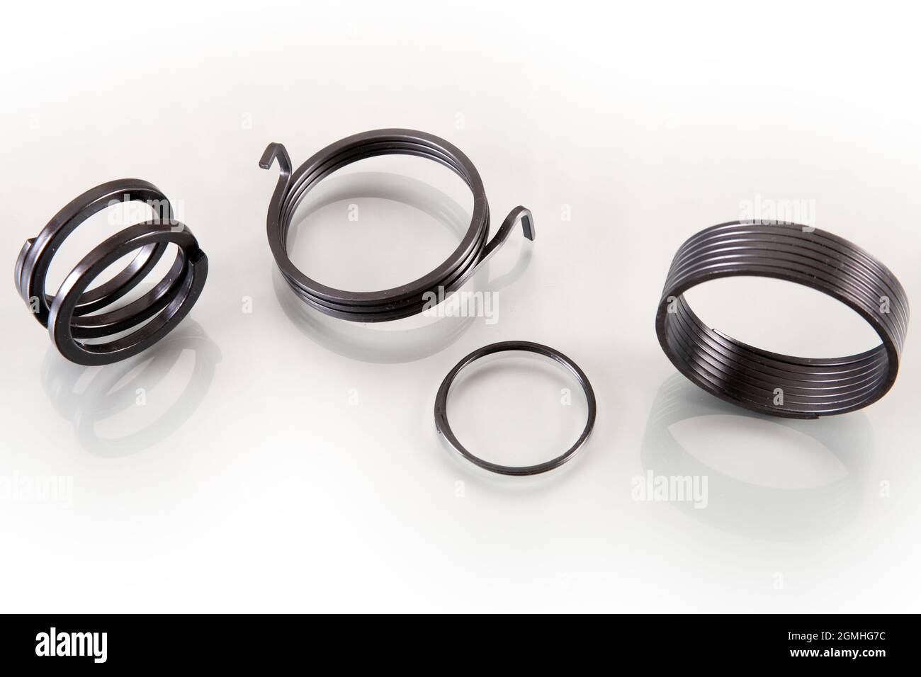 Metal springs in different sizes Stock Photo - Alamy