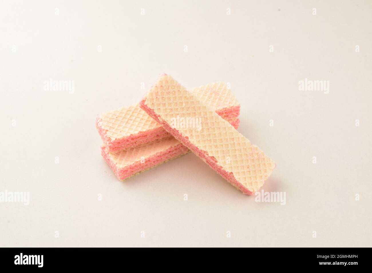 Pink Wafers Isolated on White Background Stock Photo - Alamy