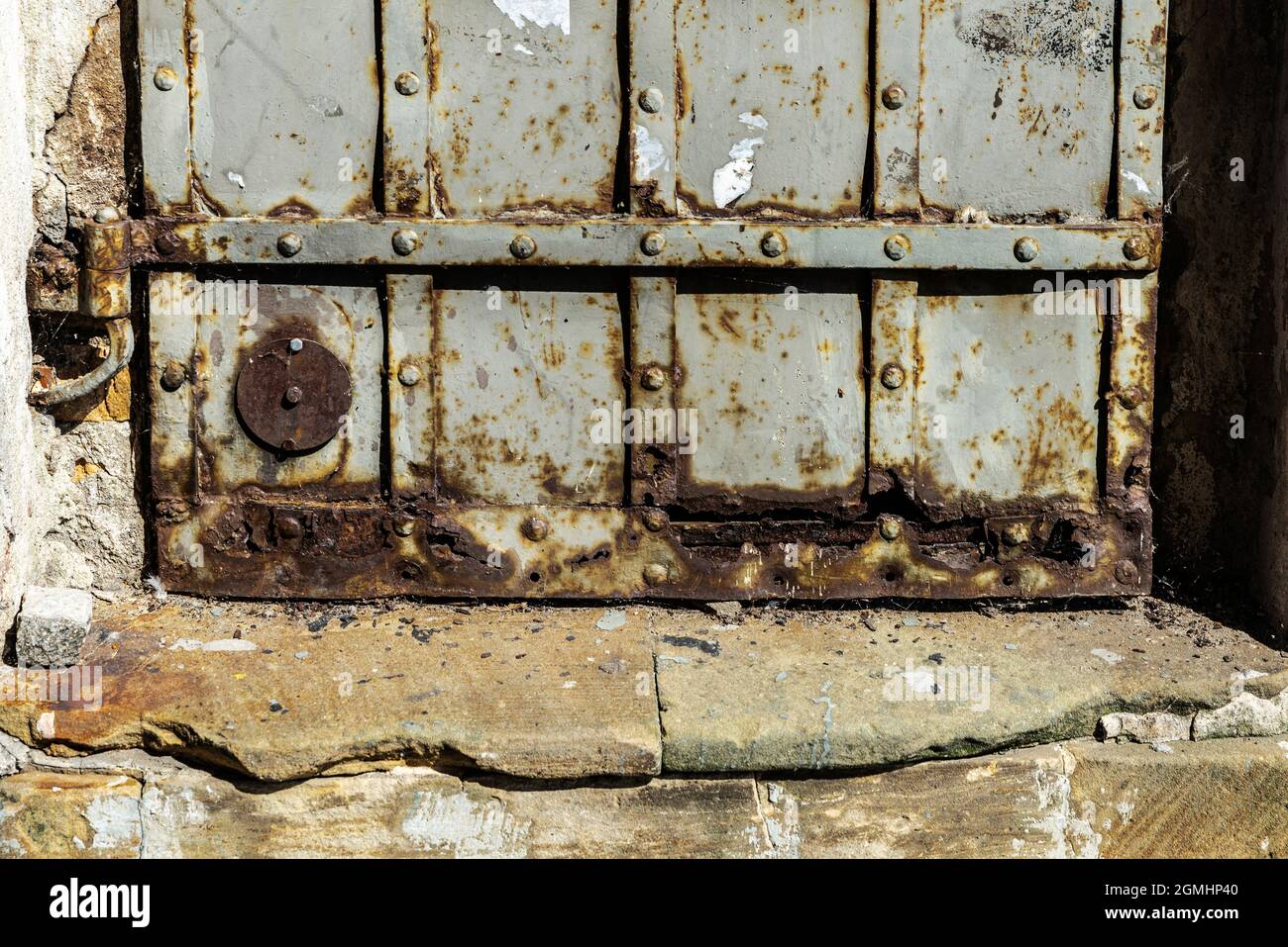 Old rusty metal door as background of an old building in Warsaw, Poland ...