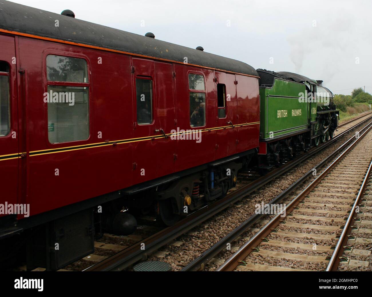 The Mayflower steam train passing through Bosham railway station in ...