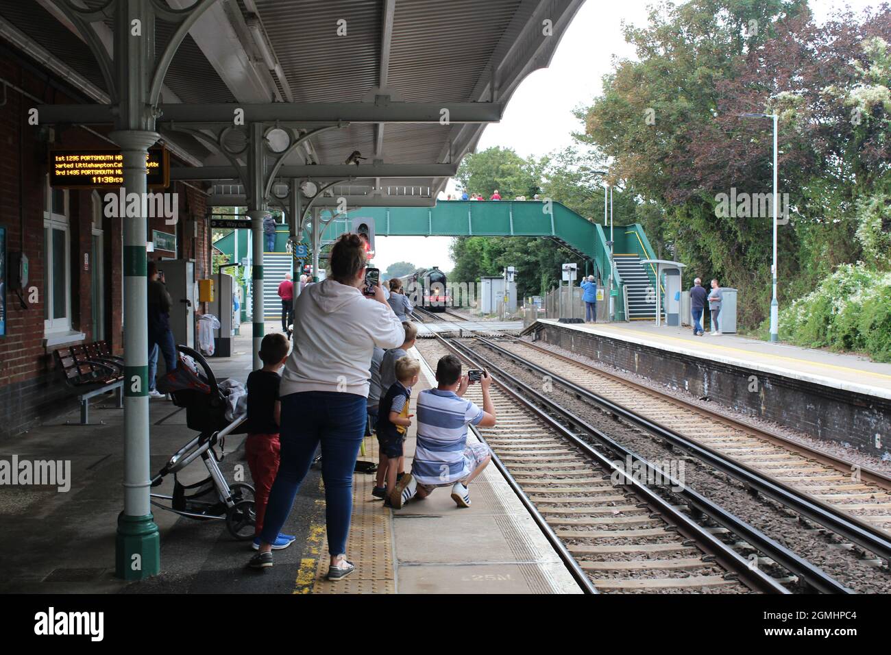 The Mayflower steam train passing through Bosham railway station in ...